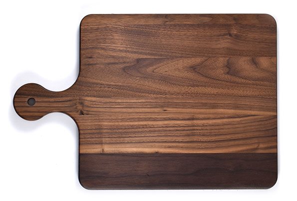 Cutting board with rounded handle