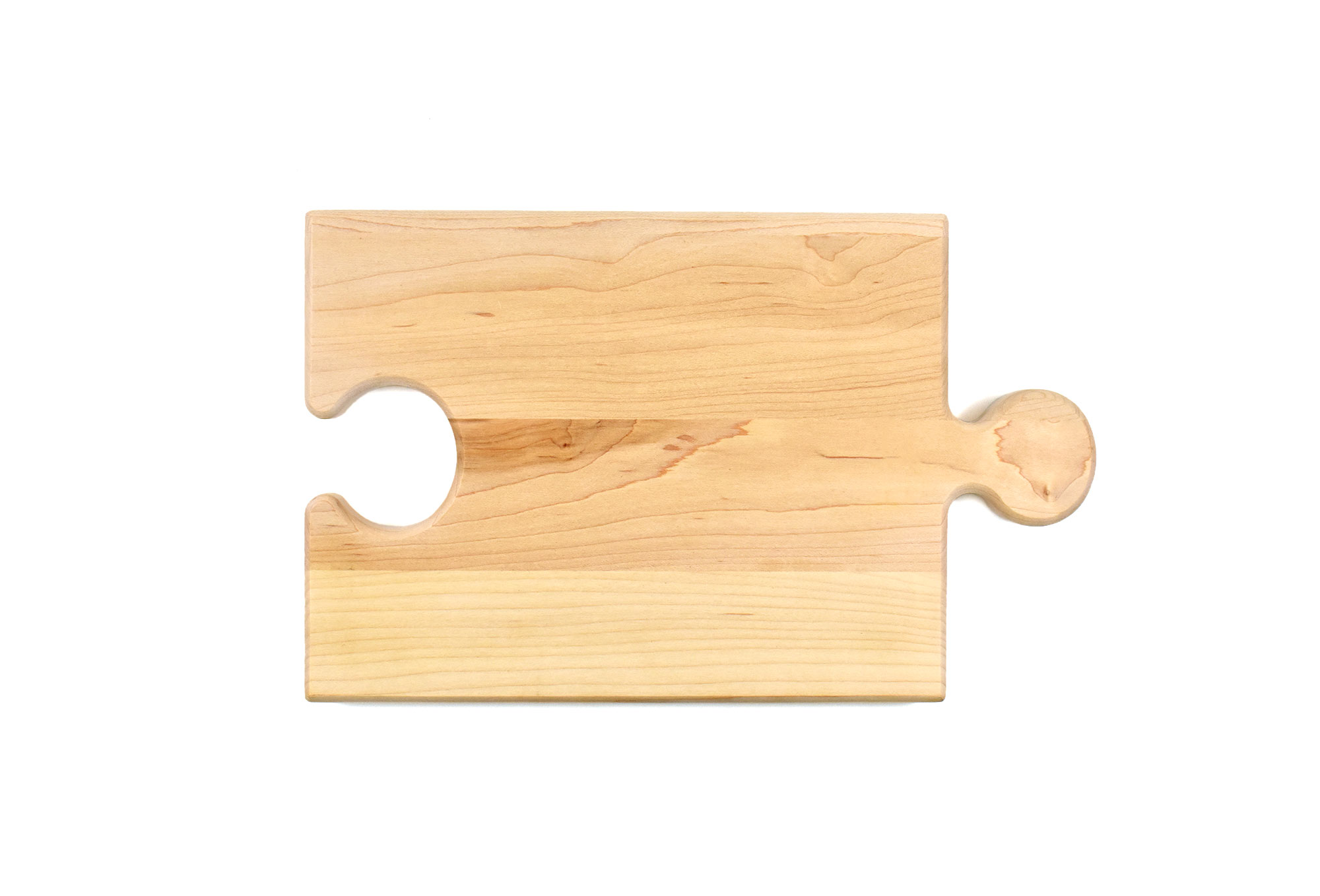 Puzzle piece cutting-serving board